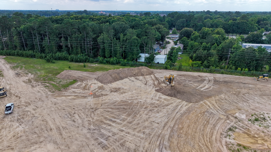 HCFCD Moving Dirt for Woodridge Village Detention Basin! - Reduce Flooding